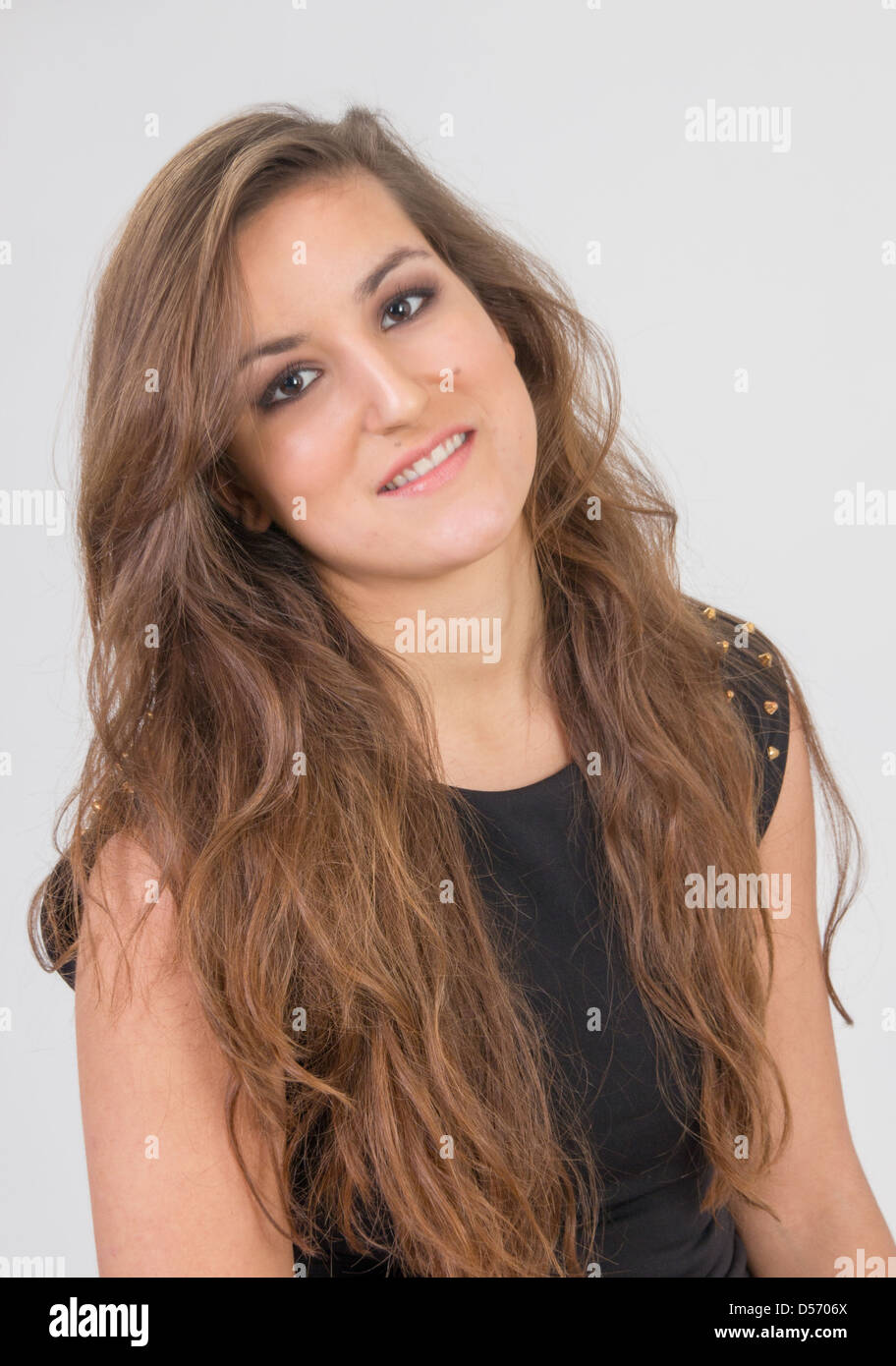 Coy smile hi-res stock photography and images - Alamy