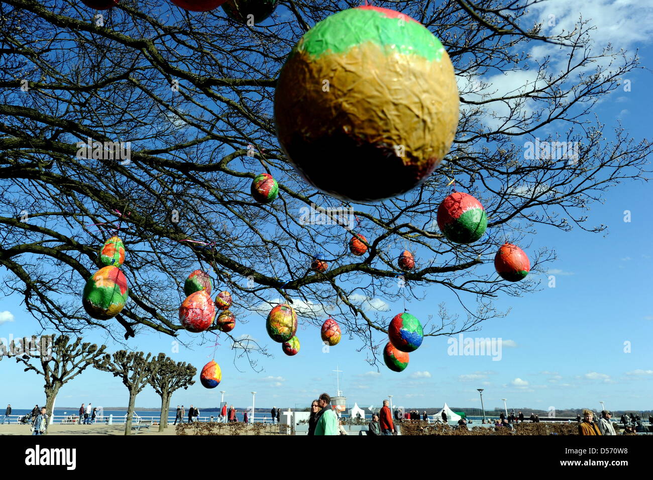 Huge Easter eggs hang in a tree in Travemuende, Germany, 02 April 2010 ...