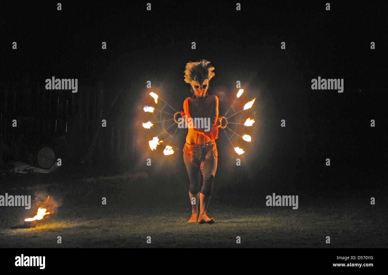 Paarl, South Africa. 24th March, 2013. A fire dancer performs during ...