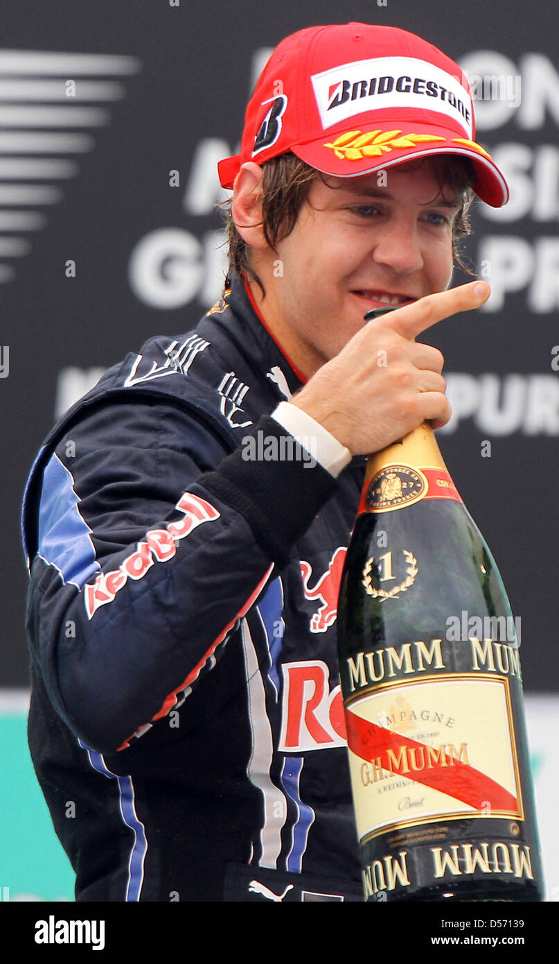 German Formula One driver Sebastian Vettel of Red Bull celebrates his ...