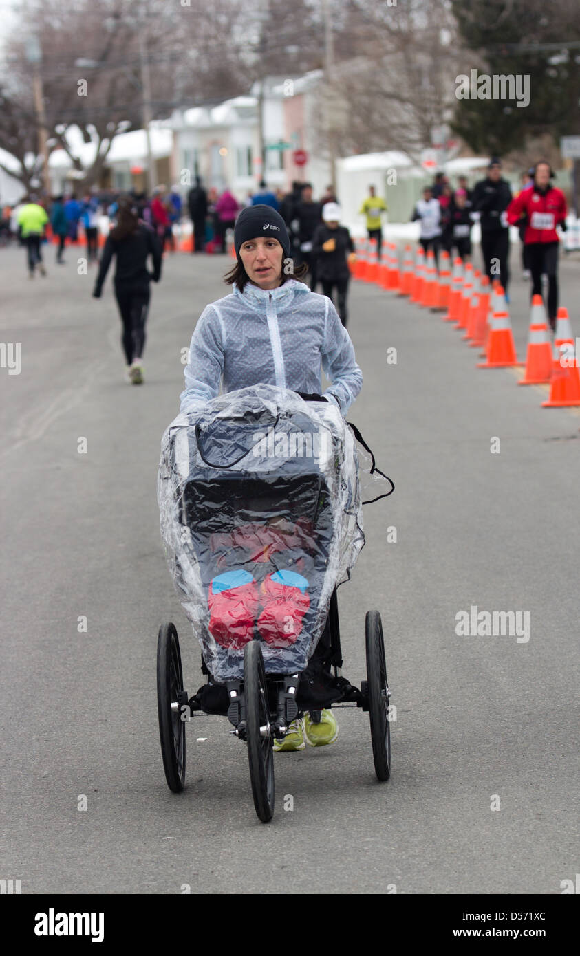 Woman baby running hi-res stock photography and images - Alamy