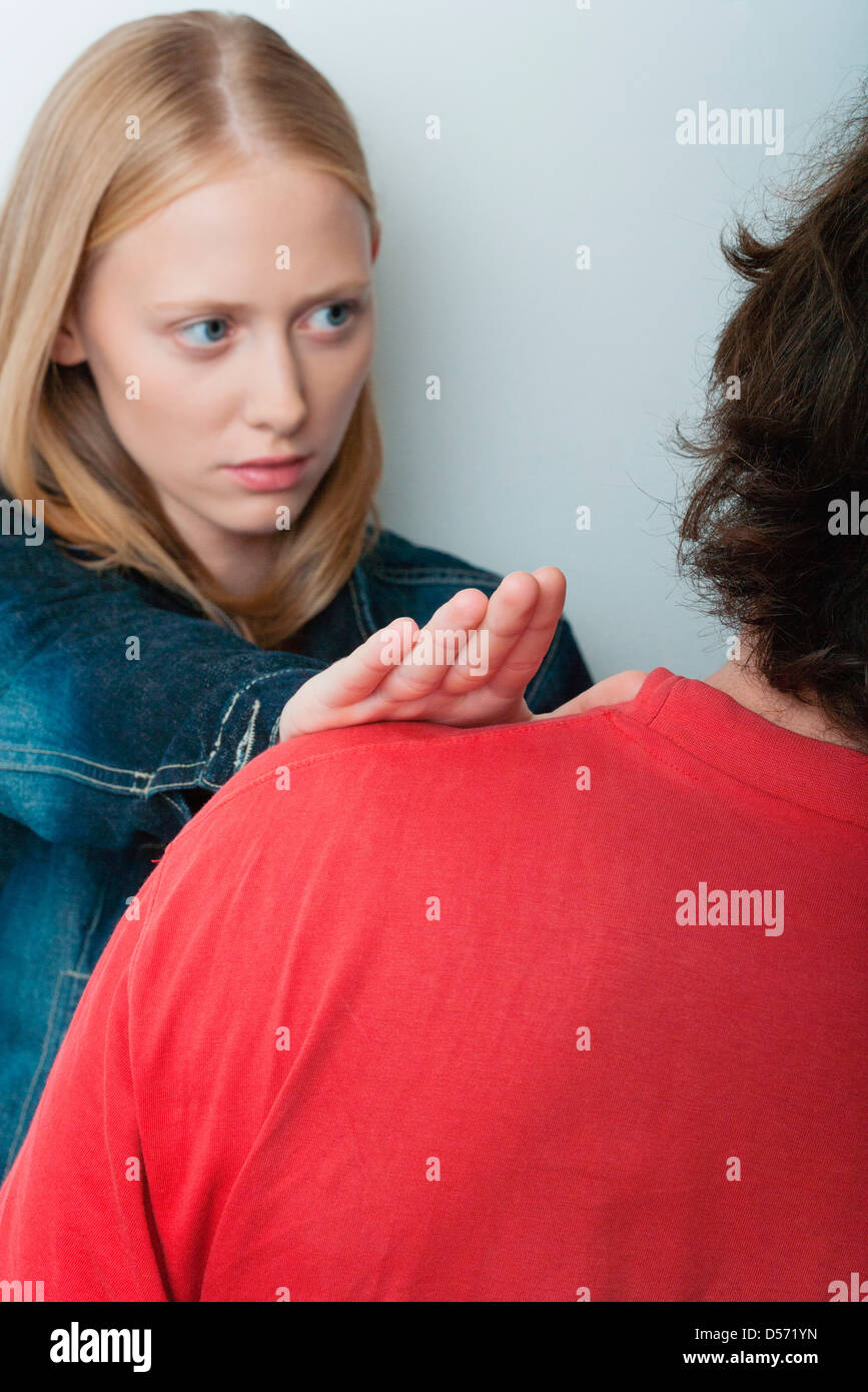 Young woman pushing man away, cropped Stock Photo - Alamy