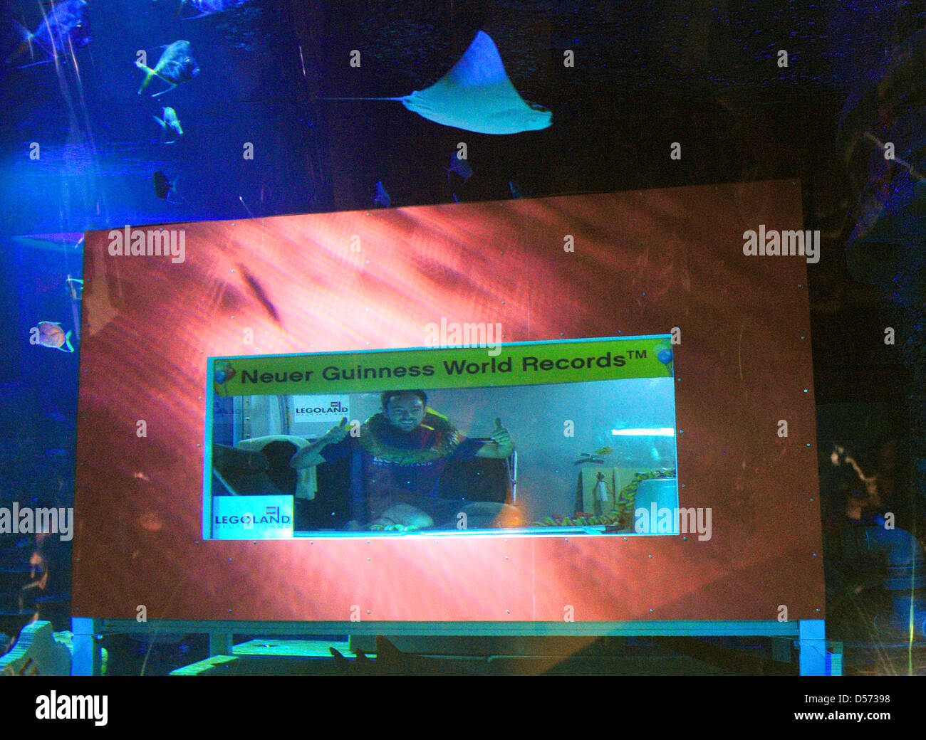 Lloyd Godson sits in his container house in Legoland near Guenzburg ...