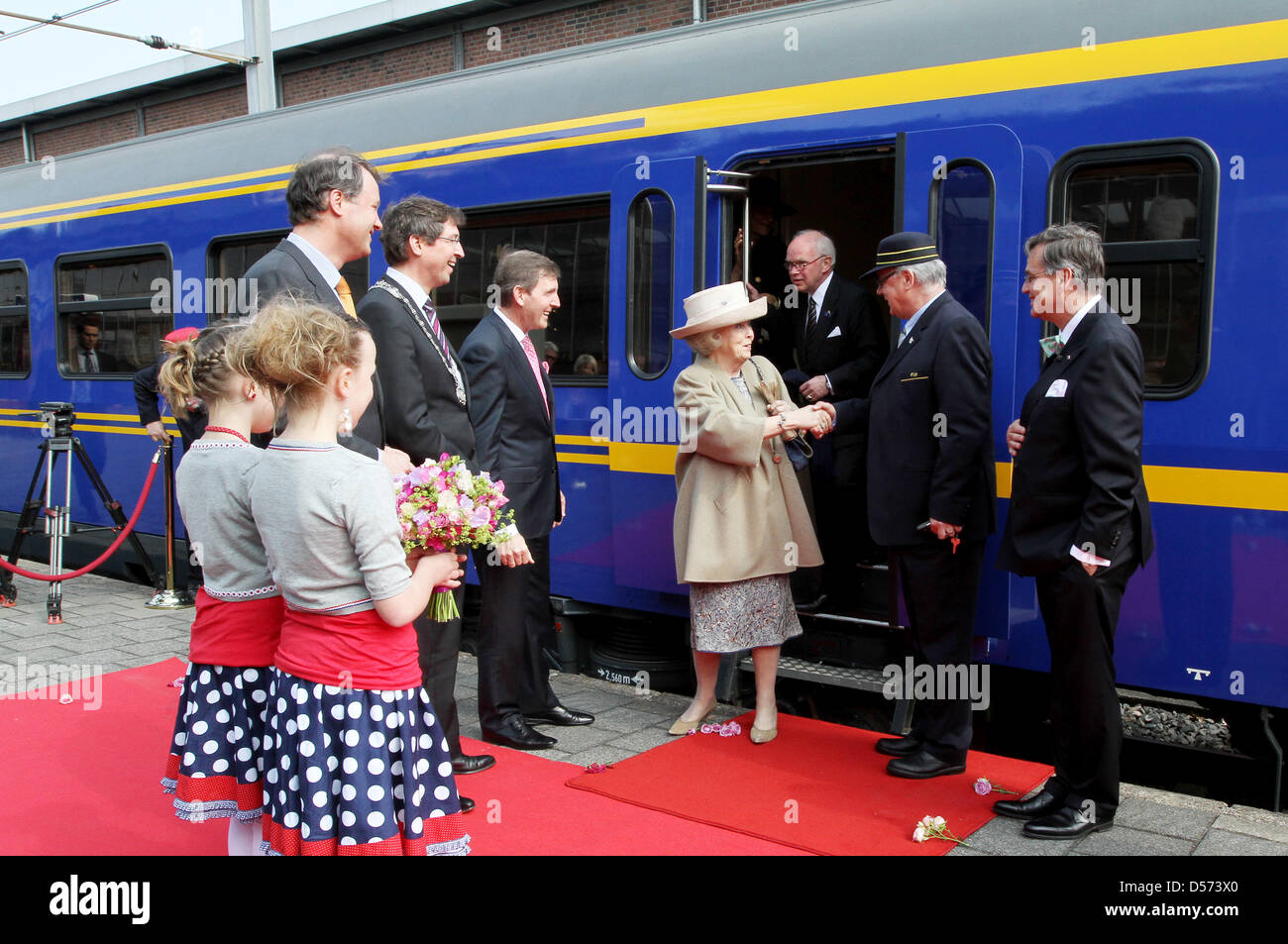 Queen Beatrix of the Netherlands (C) arrives with her own royal train ...