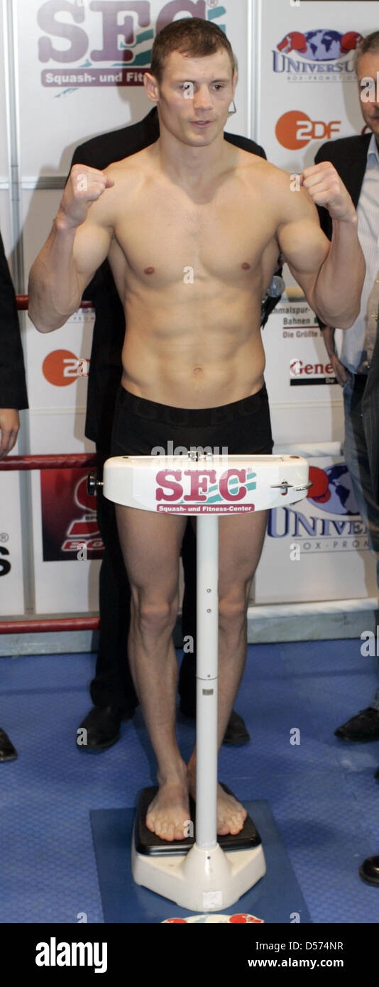 German super middleweight world champion Robert Stieglitz raises his ...