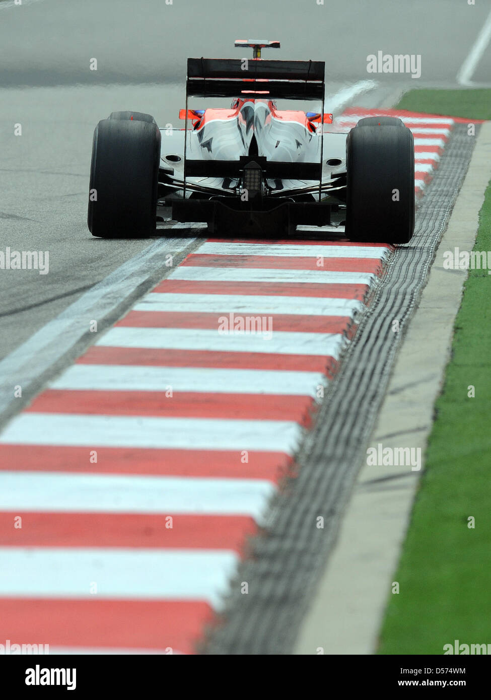 German Timo Glock of Virgin Racing races during a practice session for ...