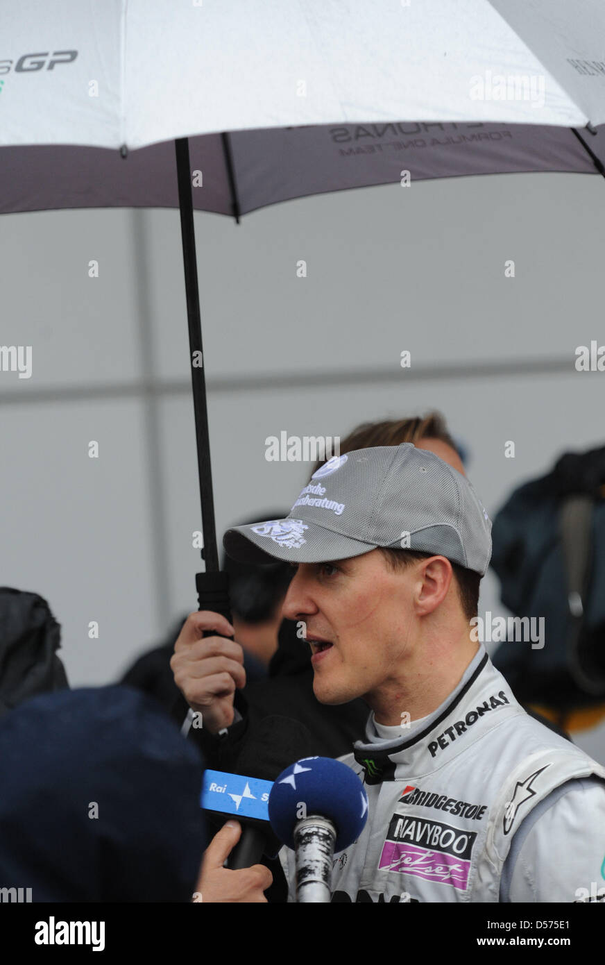 German Formula One driver Michael Schumacher of Mercedes GP gives ...