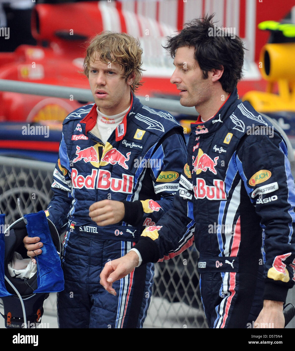 German driver Sebastian Vettel of Red Bull Racing (L) and his ...