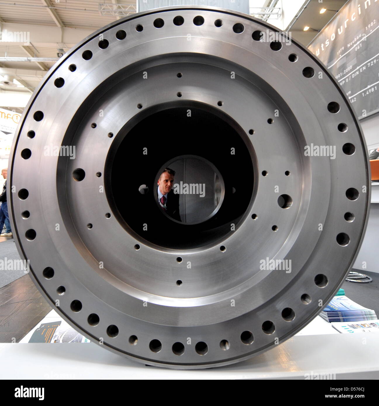 A visitor examines an engine module (Thruster) i.e. used in drilling ...