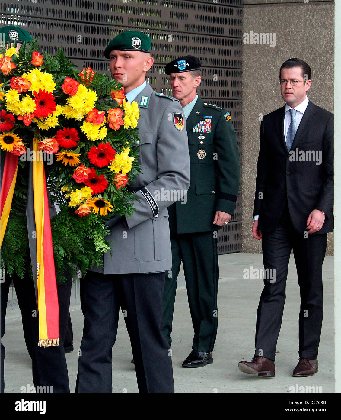 German Minister of Defence Karl-Theodor zu Guttenberg (R) and ISAF ...