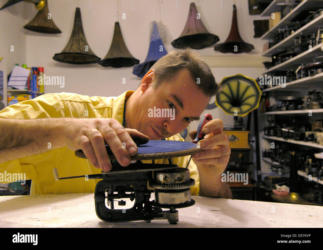 The owner of gramophone store 'Allotria' Andreas Mutscher works in his ...