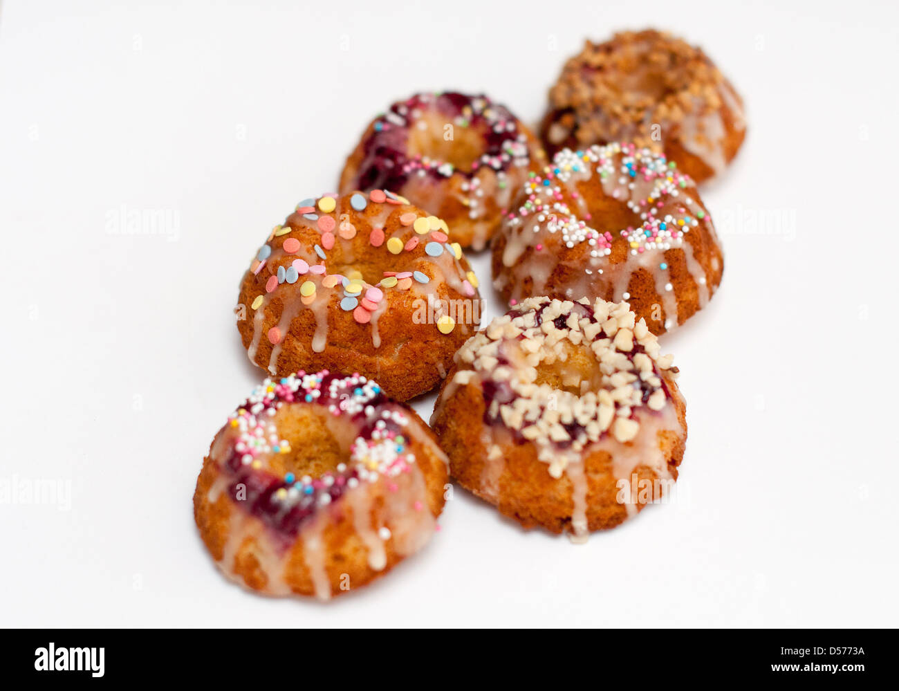 Traditional decorated ring cakes on white background Stock Photo - Alamy
