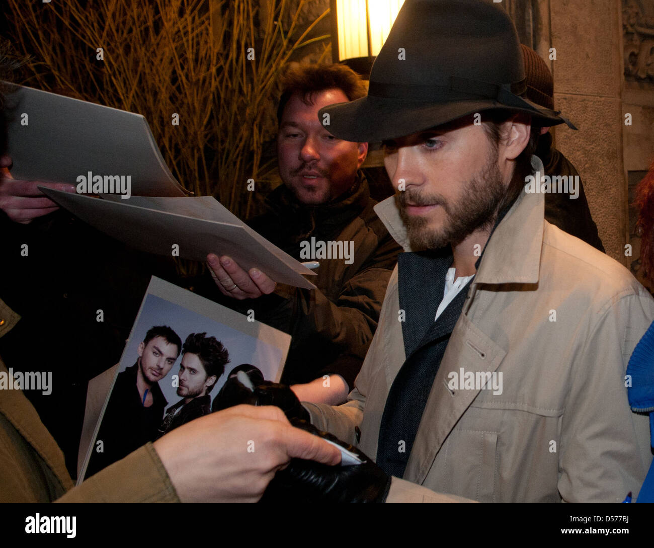 Jared Leto of 30 Seconds to Mars signing autographs whilst leaving ...