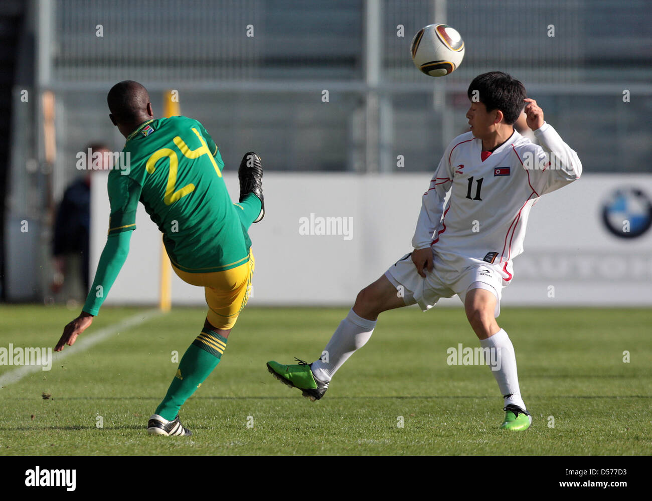 South Africa's Lucas Thwala (L) and Korea DPR's Mun In Guk (R) vie for ...