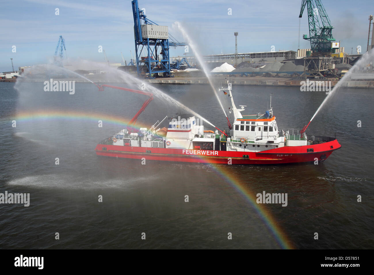 A fireboat demonstrates his techniques, where a rainbow appears in the ...