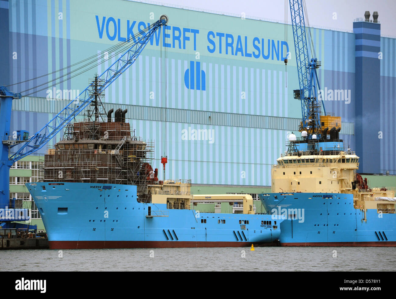 Two new anchor handling tug supply vessels (AHTS) lie towed at ...