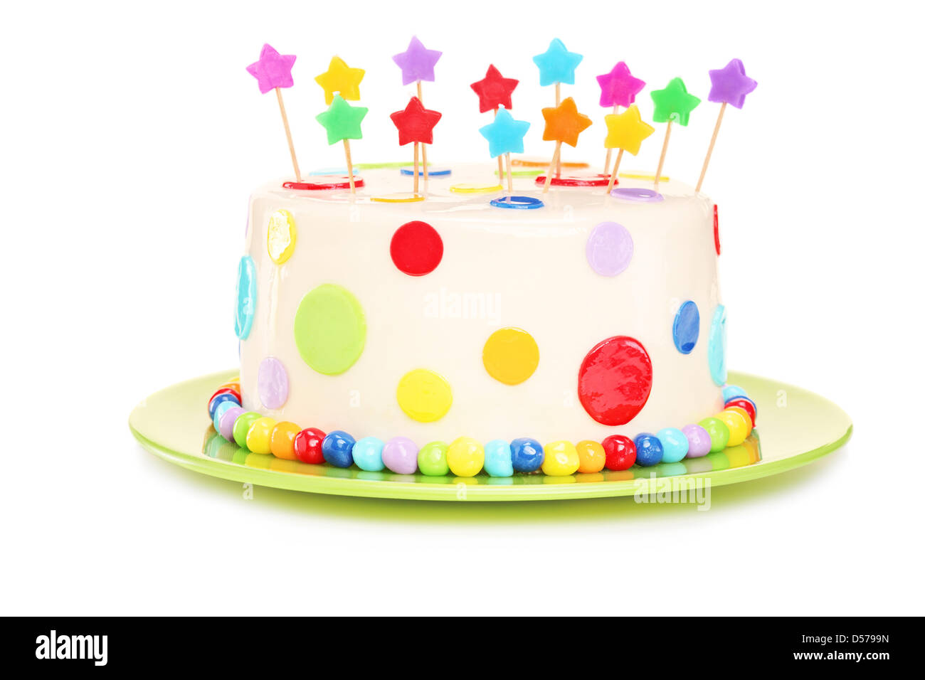 Colorful birthday cake with decorations, isolated on white background ...