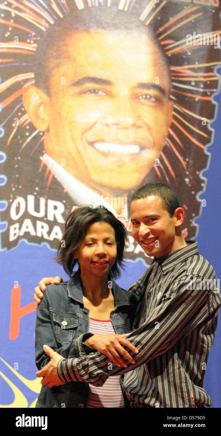 Supernumeraries Joni Smith (L) and Wilson Vanegas pose on the stage ...