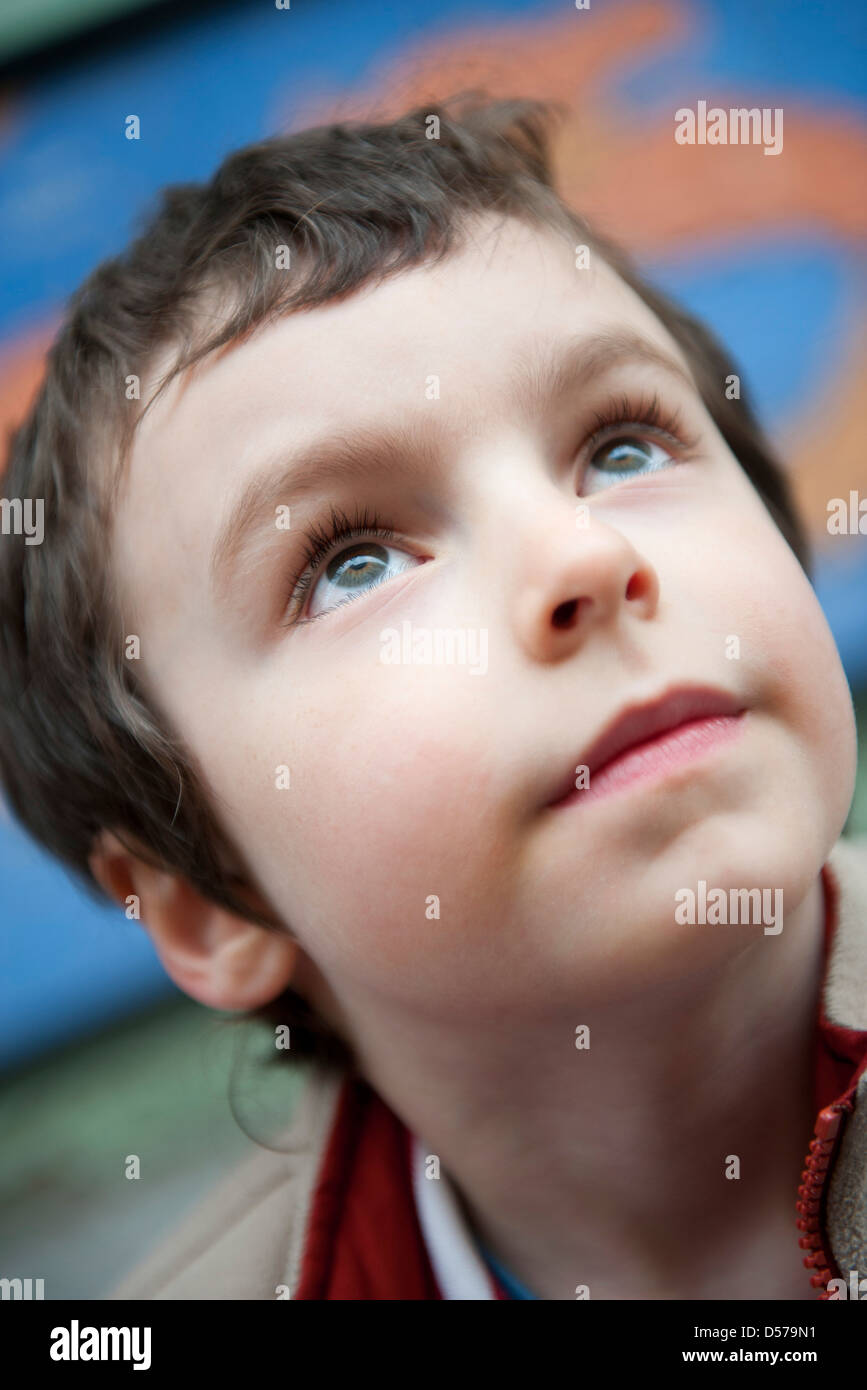 Boy looking up, portrait Stock Photo - Alamy