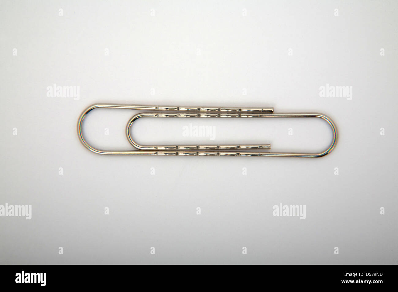 paper clip on white background Stock Photo - Alamy