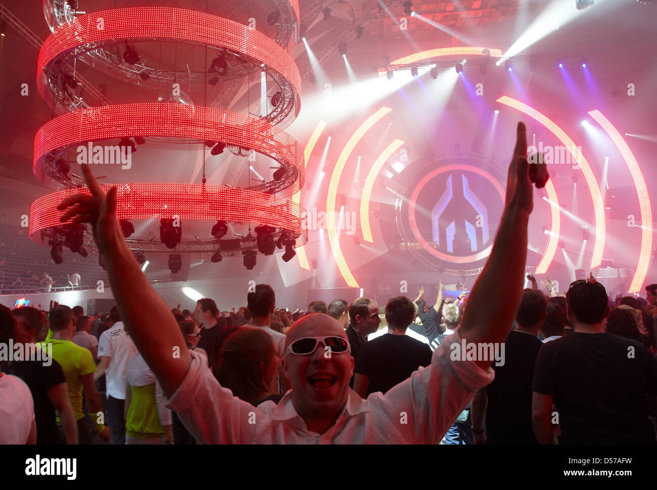 A huge party with laser beams and light effects takes place in the ...