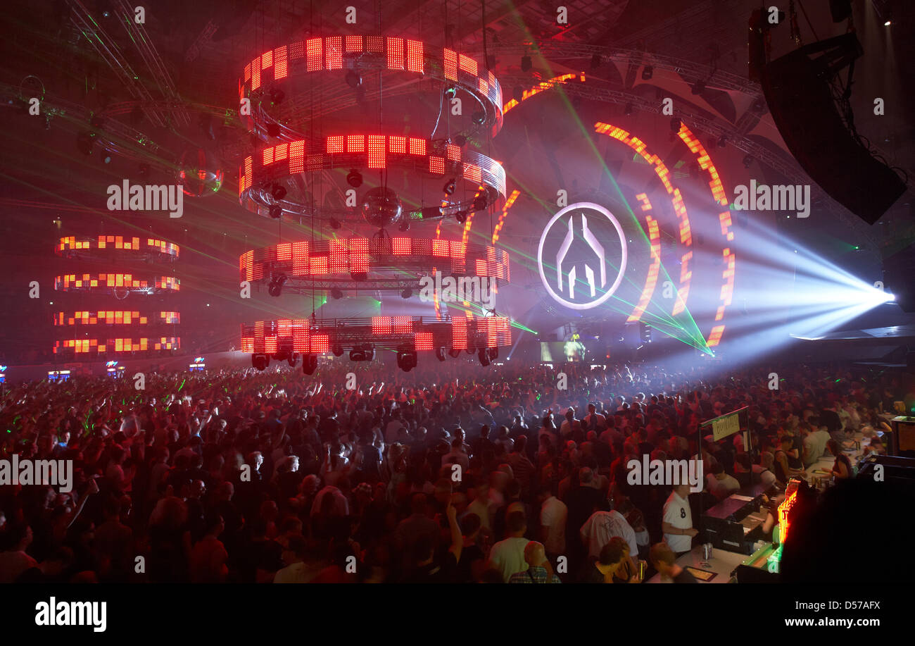 A huge party with laser beams and light effects takes place in the ...