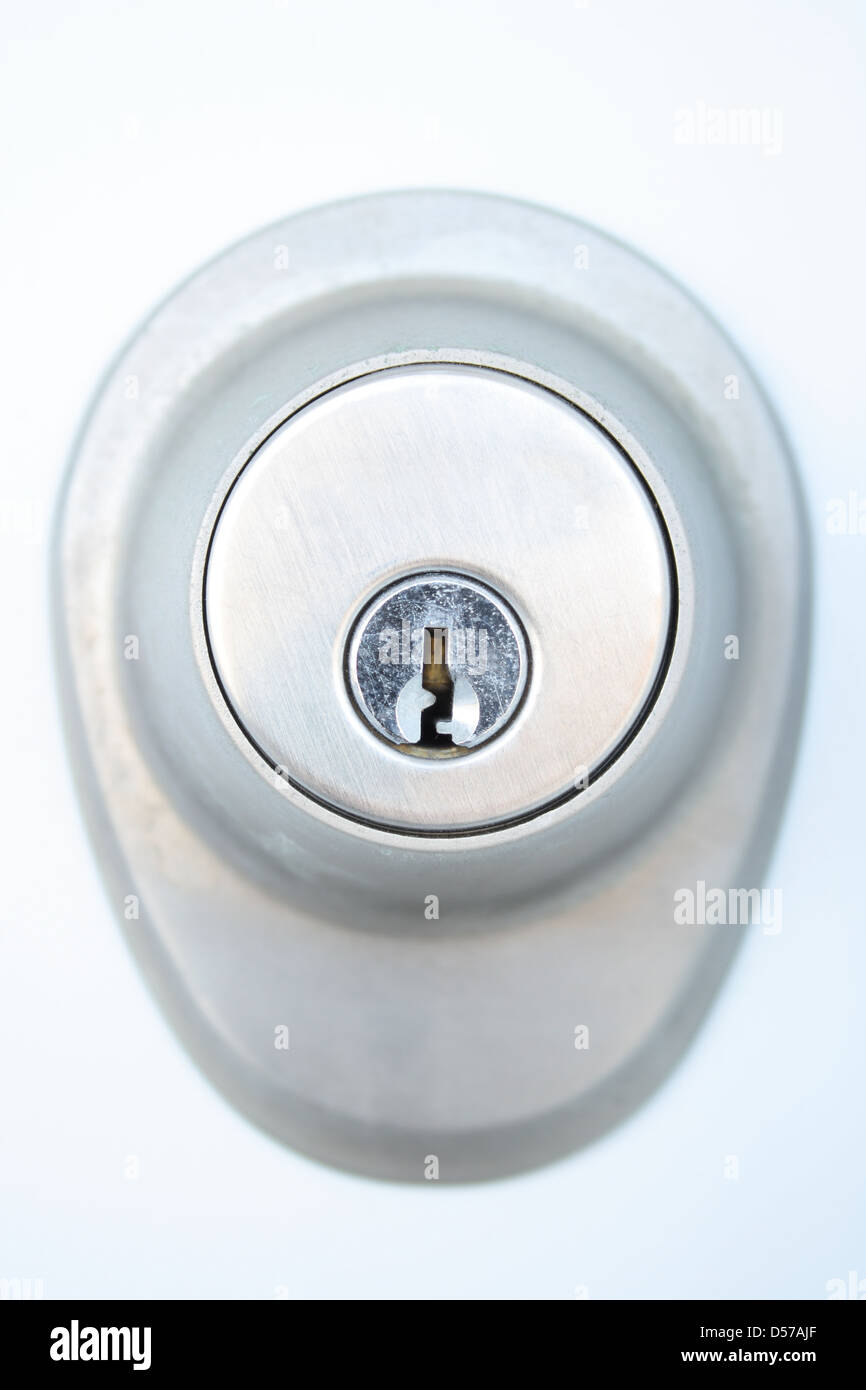 Close-up of metallic door lock with keyhole Stock Photo - Alamy