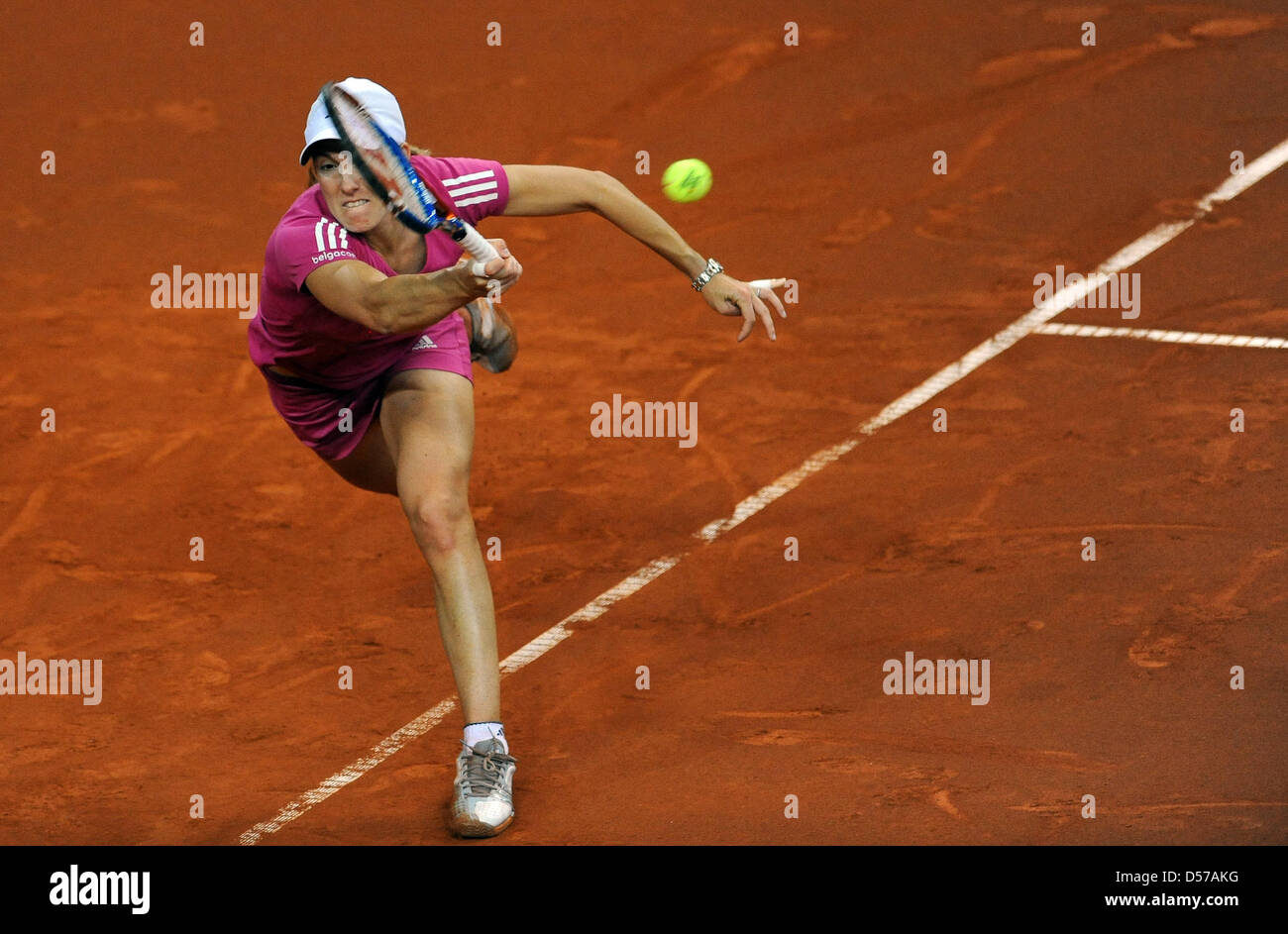 Belgian Justine Henin plays a forehand during the semi final match ...