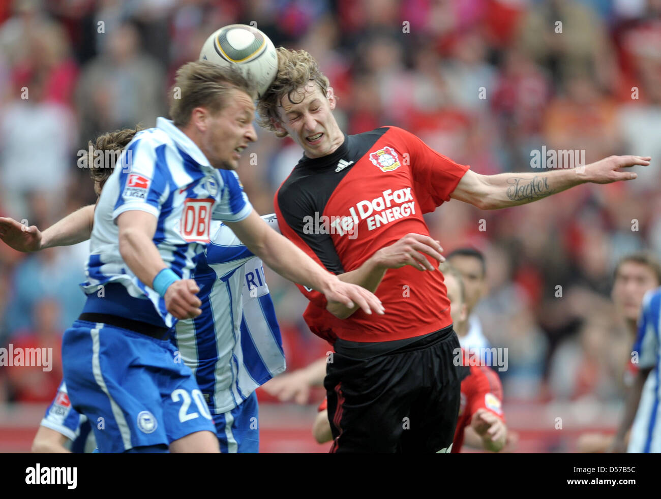 Leverkusen's Stefan Kiessling and Berlin's goalkeeper Patrick Ebert (L) vie for the ball during ...