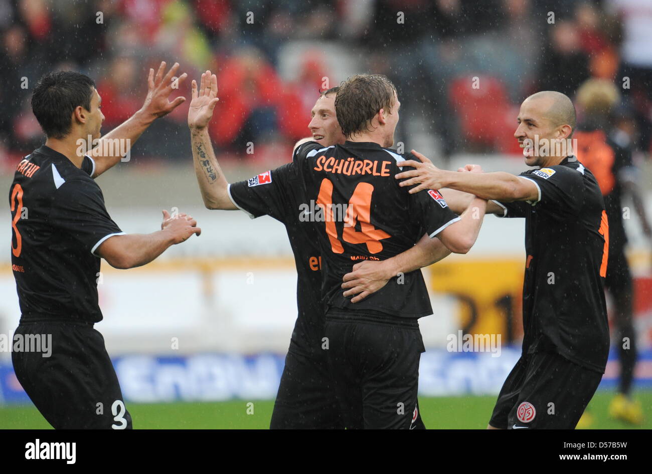 Mainz' players celebrate the goal to the score 2-0 by Andre Schuerrle ...