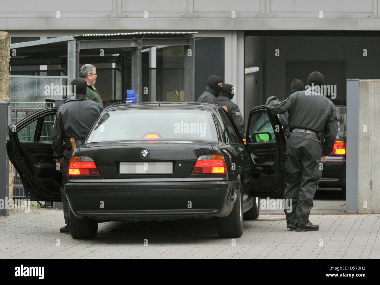 Mummed officers of the German Special Police Forces (SEK) secure the ...