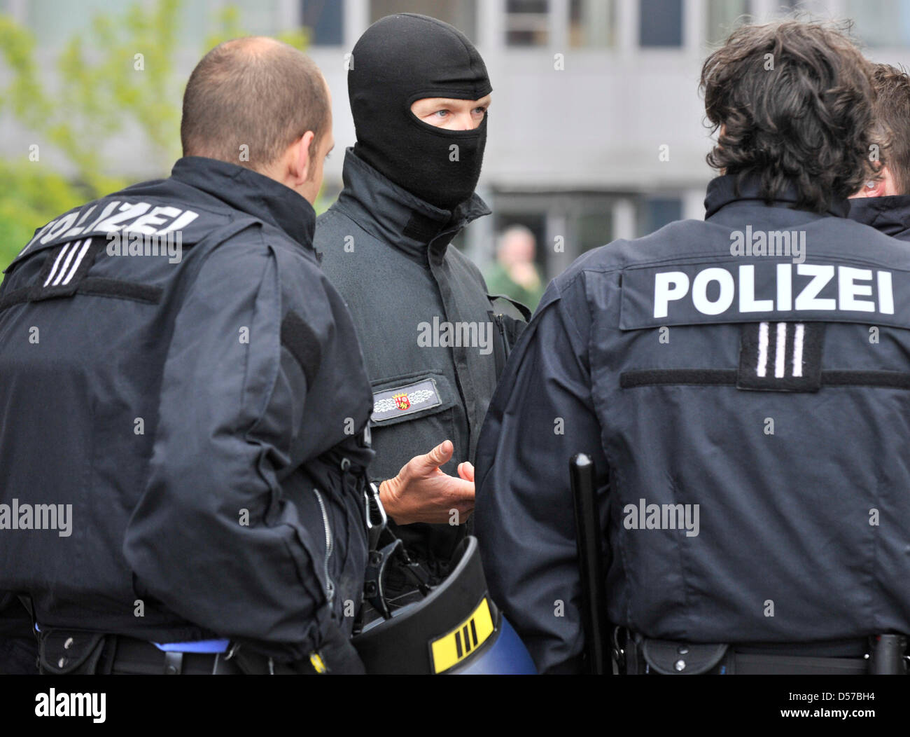 Mummed officers of the German Special Police Forces (SEK) secure the ...