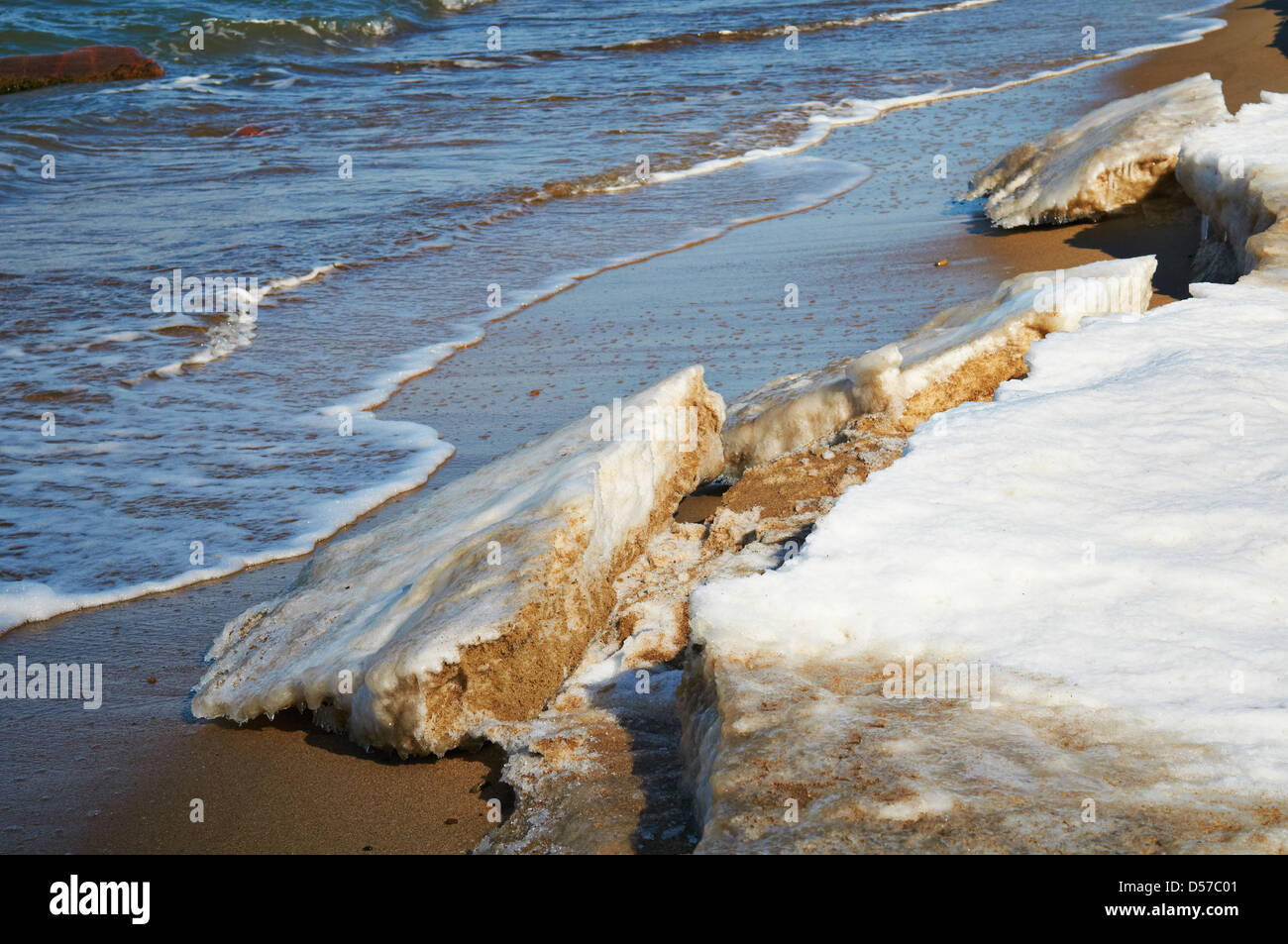 Ice-covered sea beach Stock Photo - Alamy