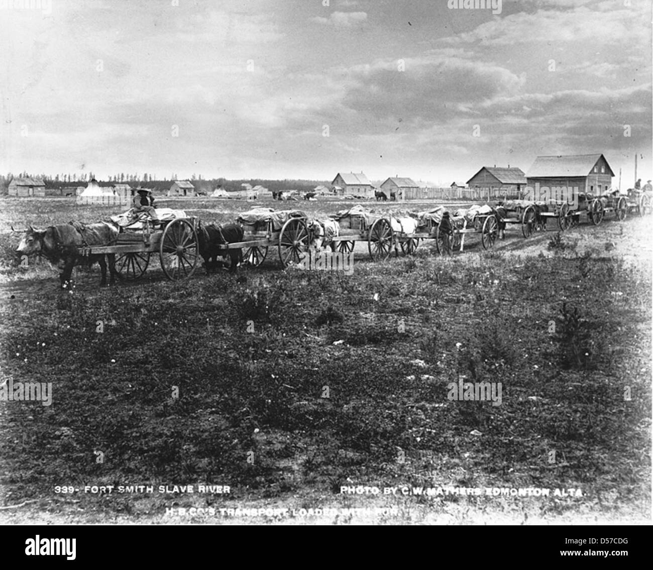 A historic photograph of a Hudson’s Bay Company transport boat loaded ...