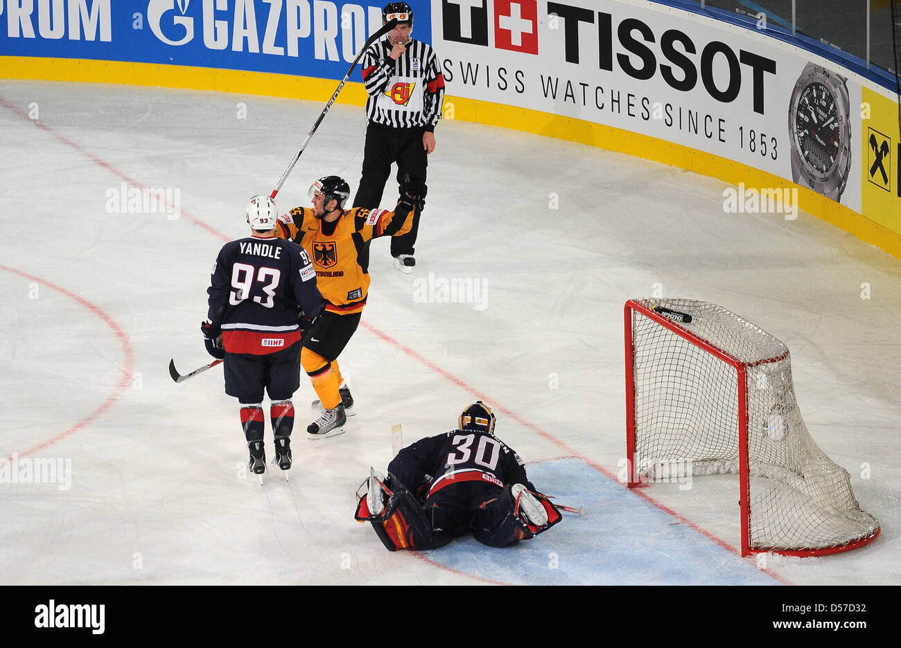 Germany's Felix Schuetz (C) celebrates hiis 1-2 during 2010 IIHF World ...