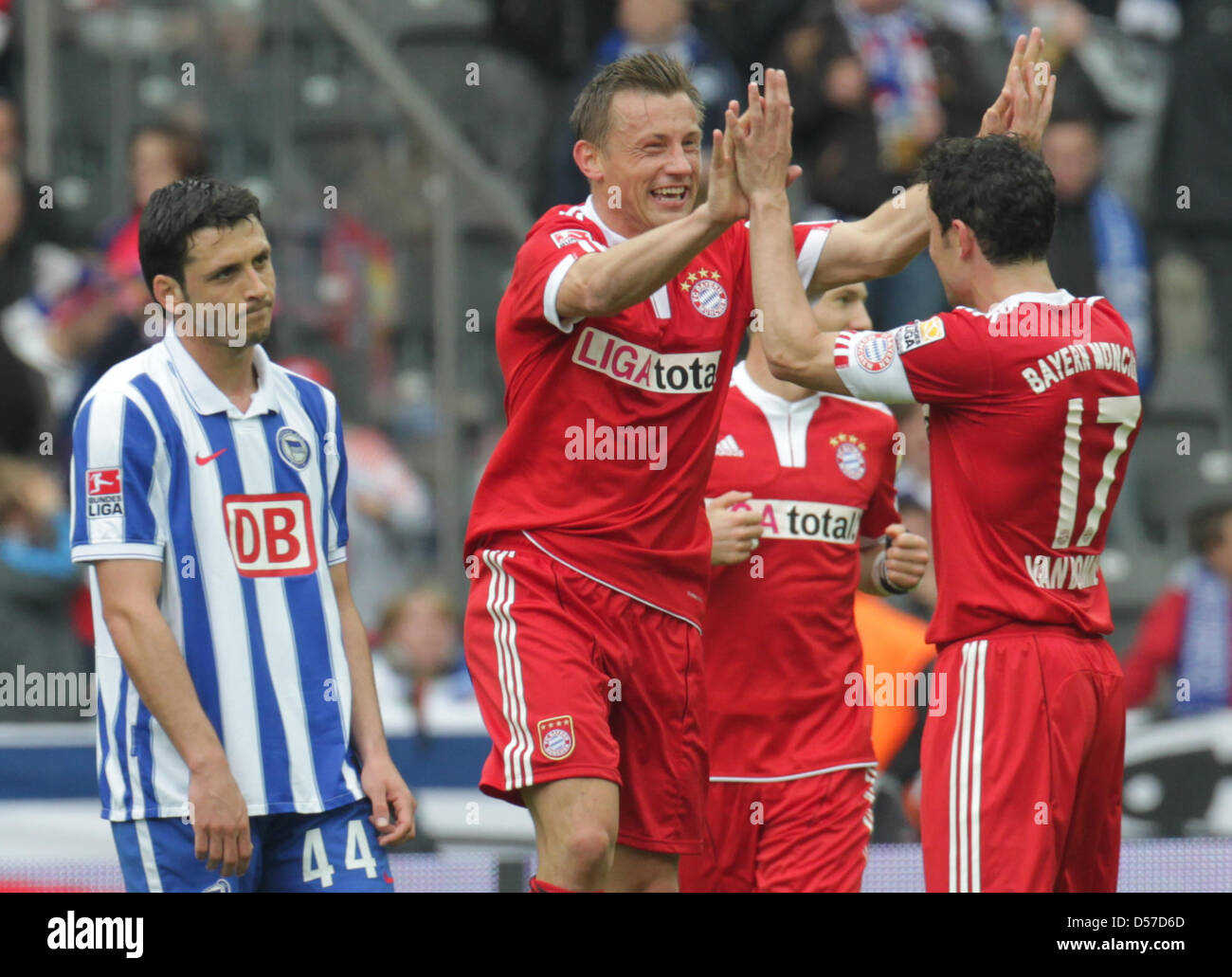 Bayern Munich's Ivica Olic (C) celebrates his 0-1 during German ...