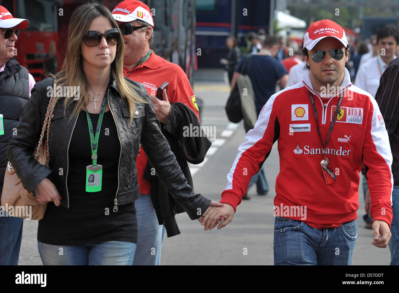 Brazilian driver Felipe Massa of Scuderia Ferrari (R) and his wife ...
