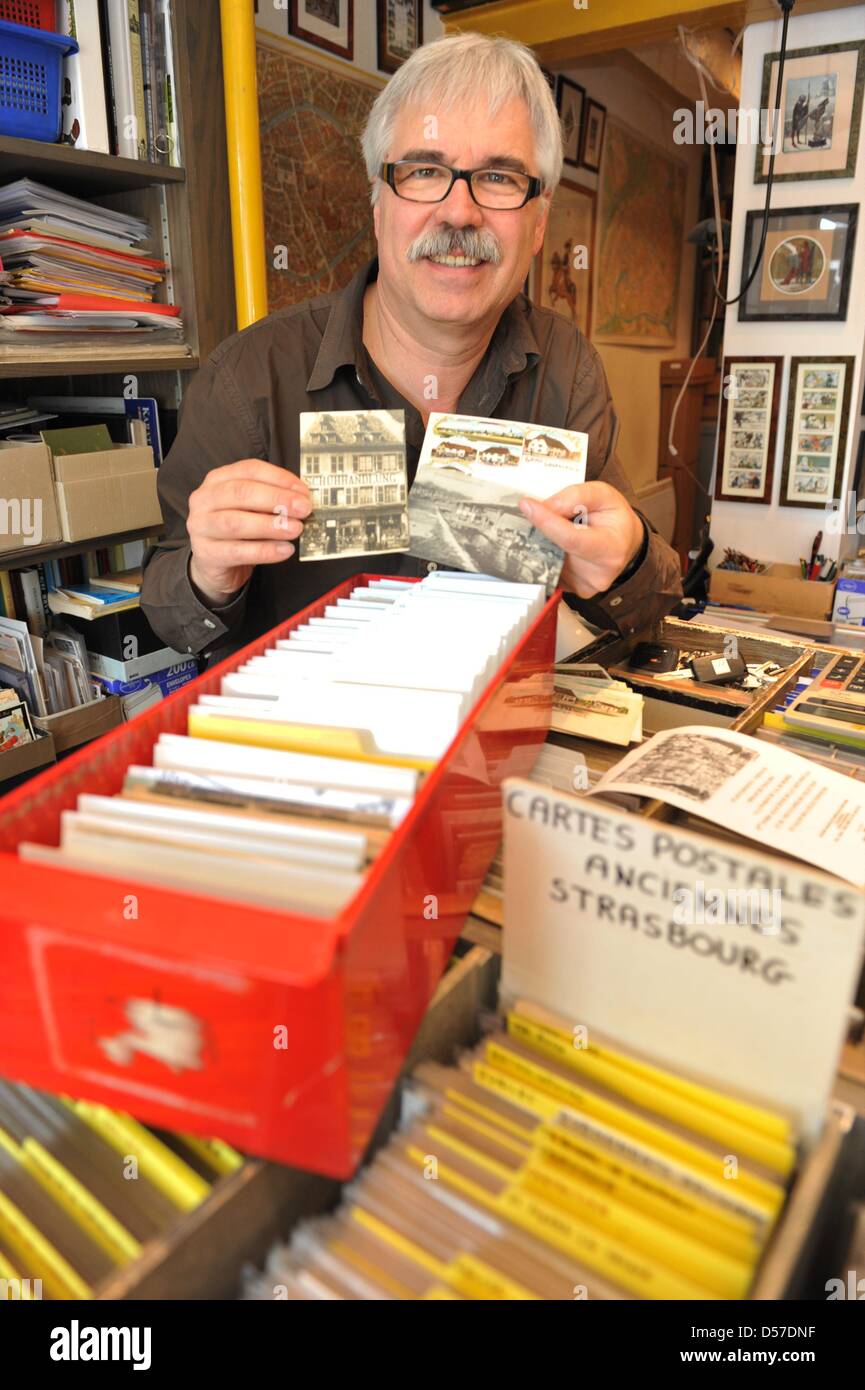 Vincent Kaufmann, collector of historical postcards, in his shop in ...