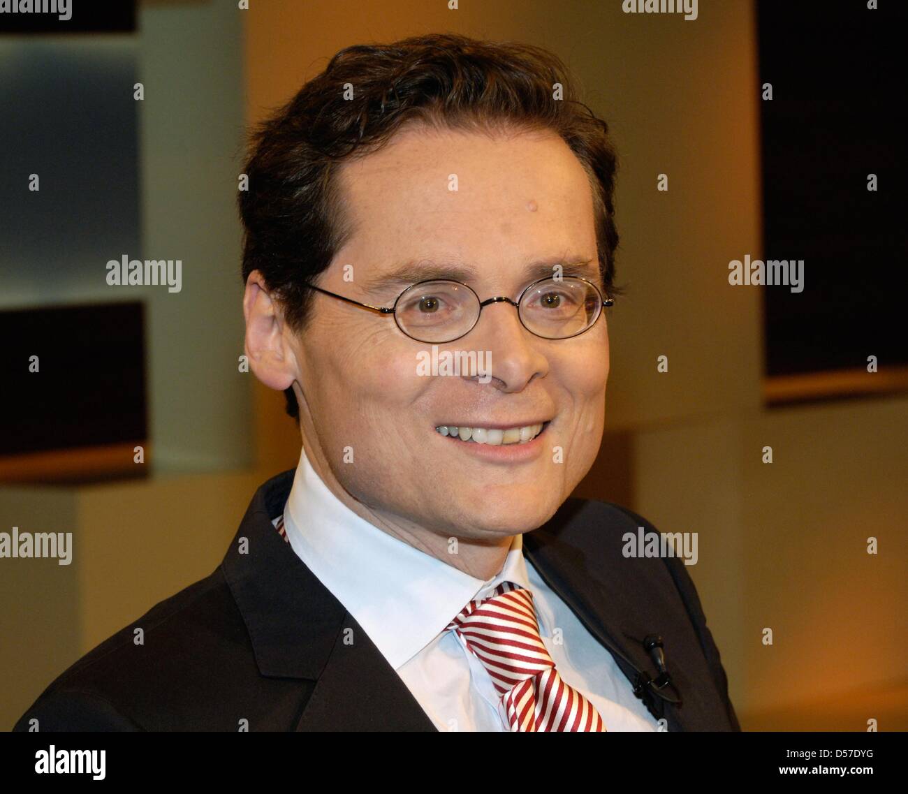 Swiss publicist Roger Koeppel smiles during TV panel programme 'Anne ...