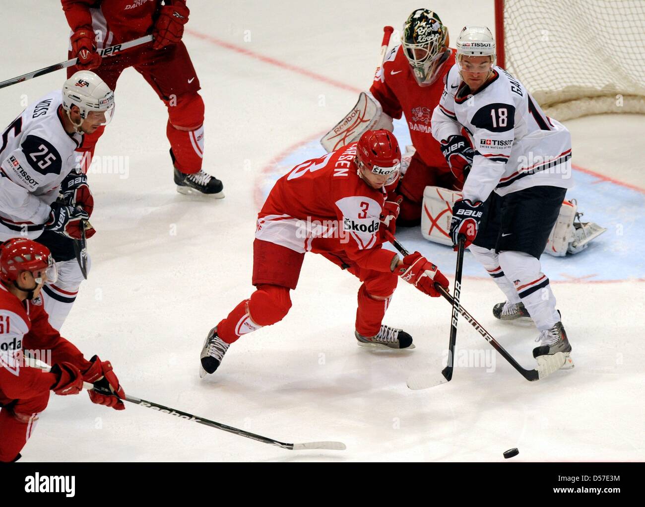 USA's TJ Galiardi (R) and Danish Philip Larsen (C) and goalkeeper ...