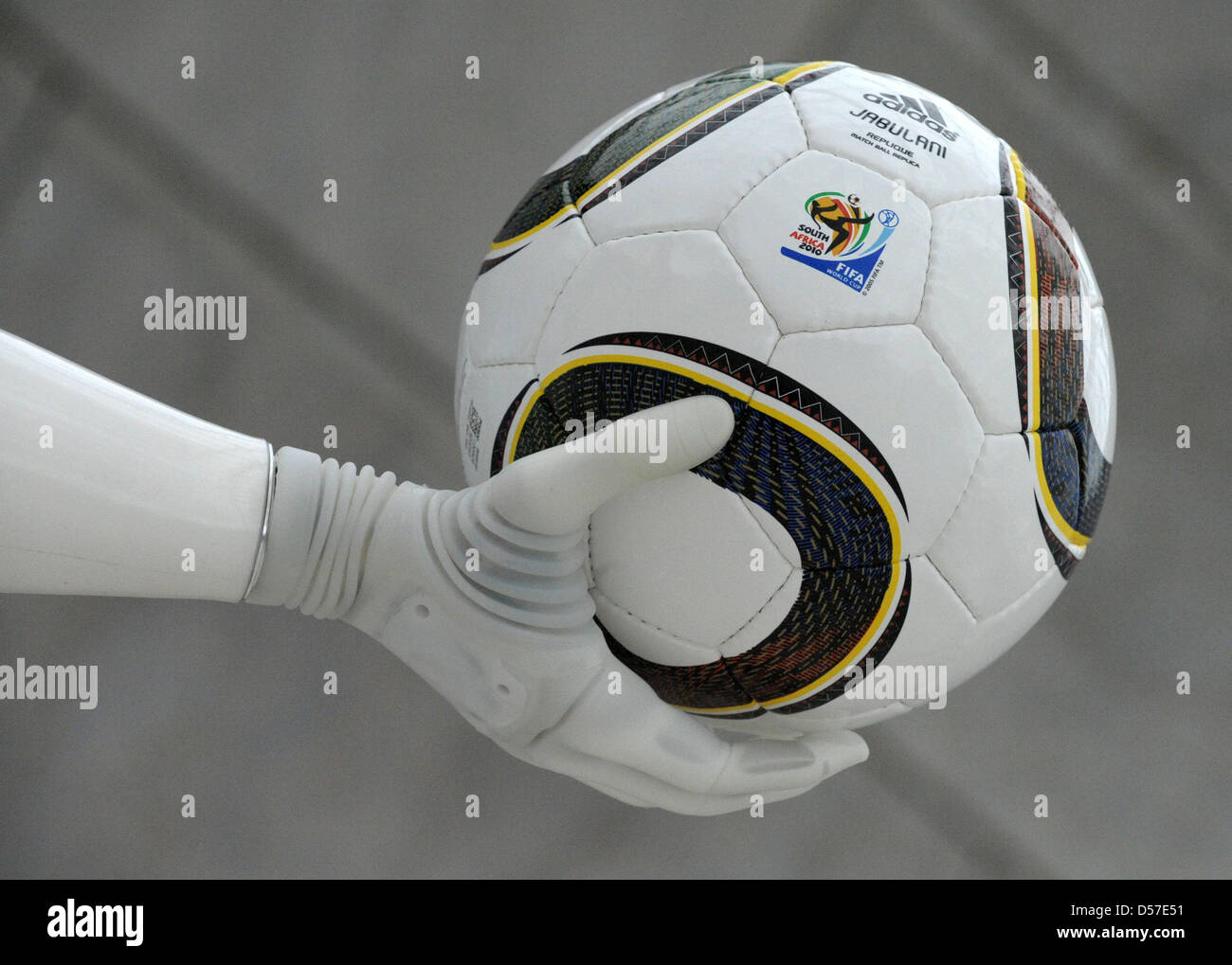The new hand prosthesis 'Michelangelo' holds the FIFA World Cup 2010 ...