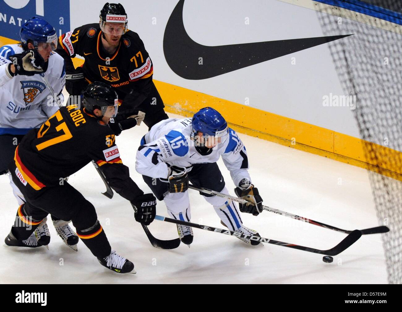 Germany's Marcel Goc (2-L) and Nicolai Goc (3-L) and Finland's Leo ...