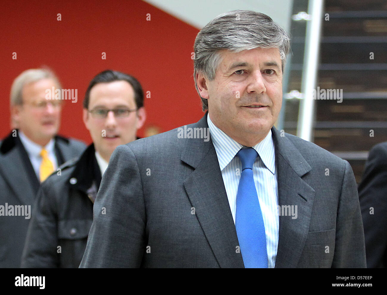 Deutsche Bank CEO Josef Ackermann (front) leaves the regional court ...