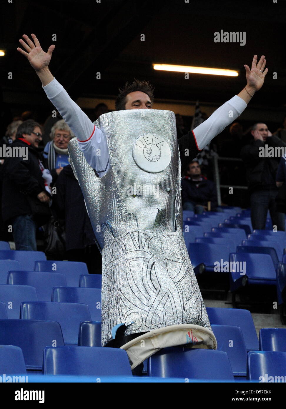 A supporter of Fulham dressed in a Europa League Trophy costume is seen ...