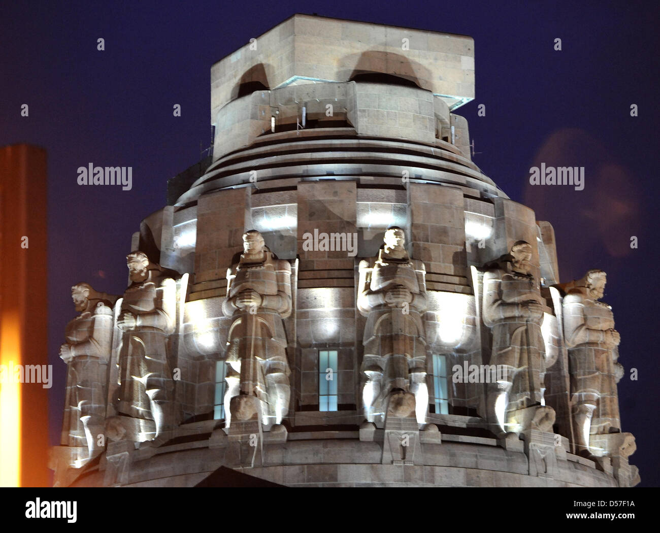 Twelve statues of armor-clad watchmen are illuminated in 91 metres ...