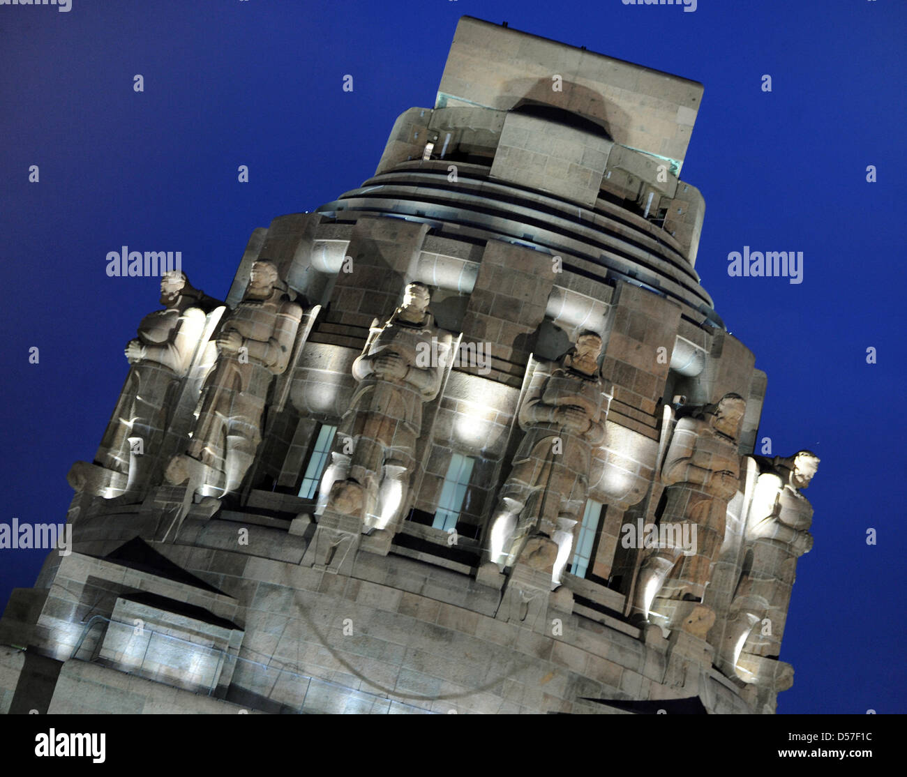 Twelve statues of armor-clad watchmen are illuminated in 91 metres ...