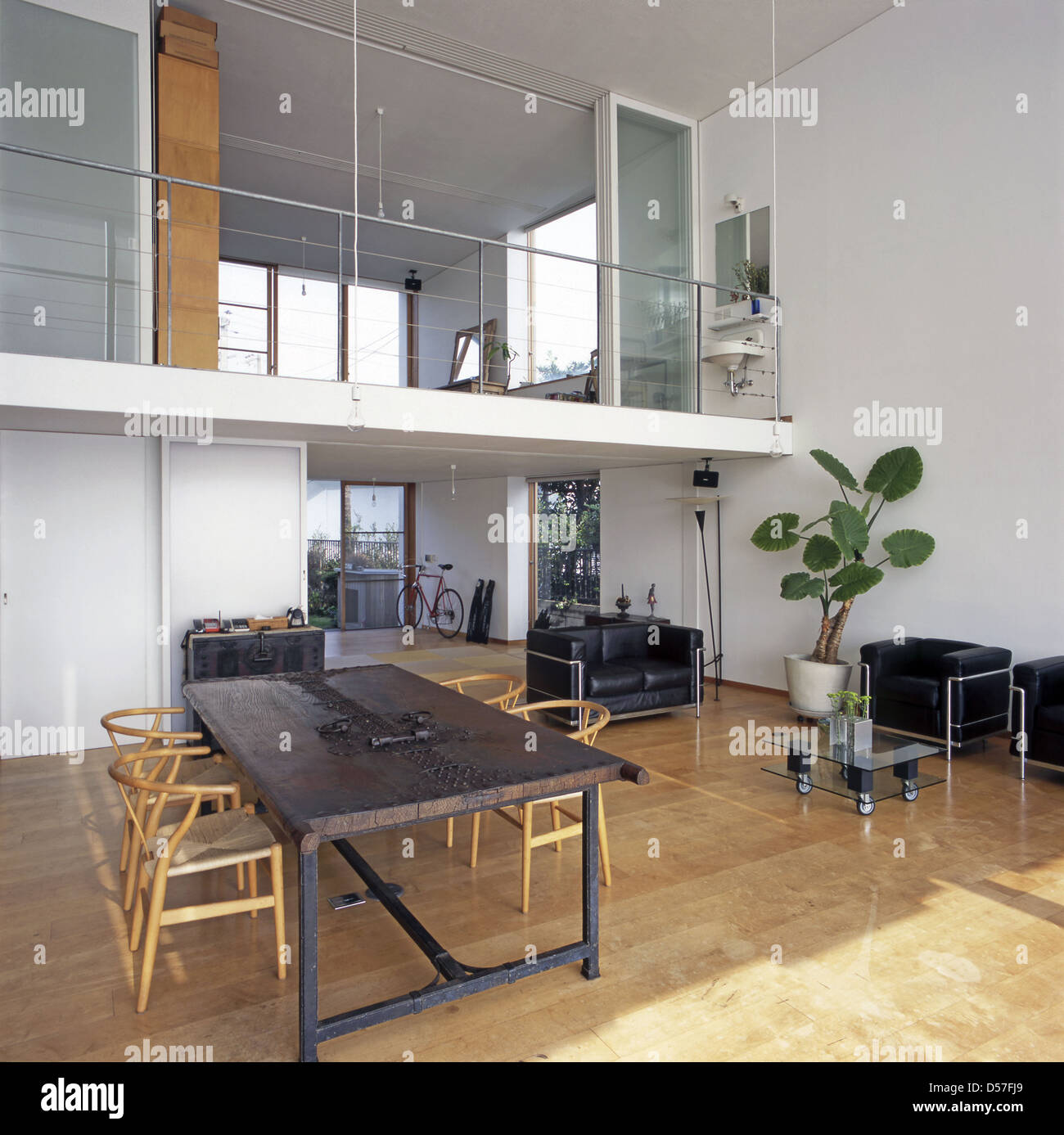 Living room and dining room in a contemporary loft in a japanese home ...