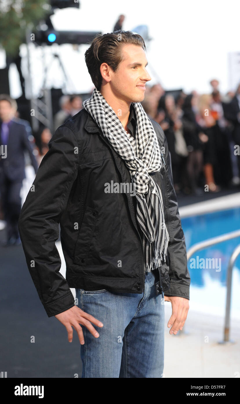 German driver Adrian Sutil of Force India presents fashion by Amber ...