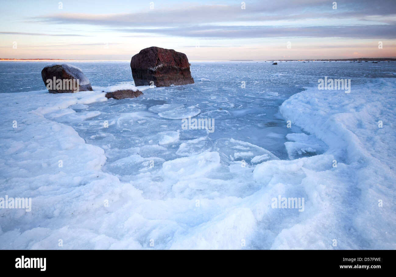 Winter landscape with ice and stones on frozen Baltic Sea Stock Photo ...