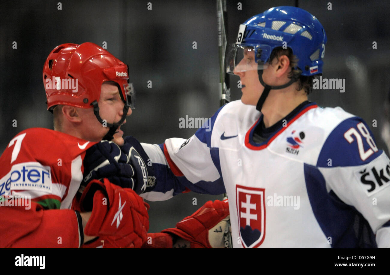 Belarussia's Vladimir Denisov (L) and Slovakia's Richard Panik (R) vie ...